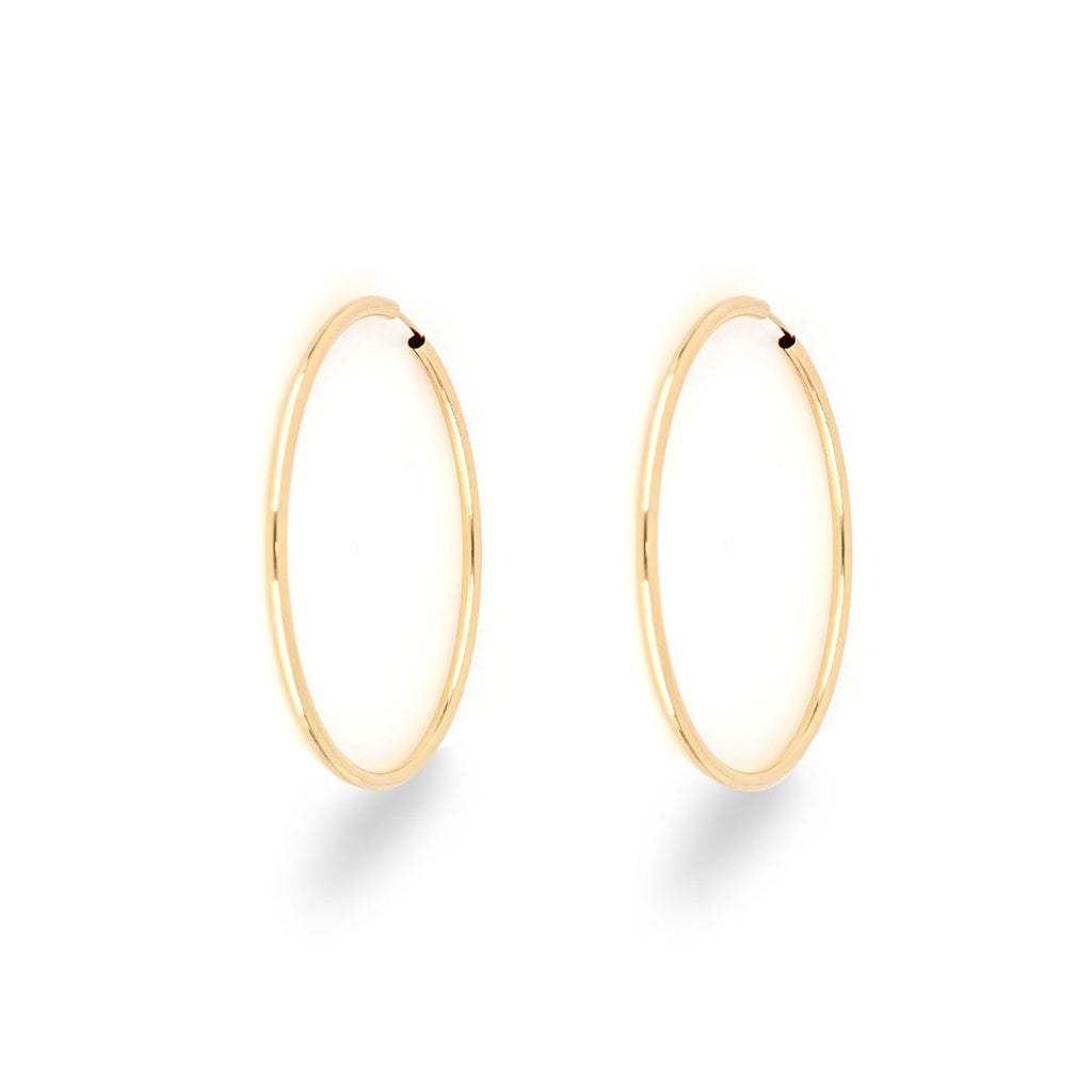 Fabiani earrings in 18Kt yellow gold with round barrel – Fabiani ...